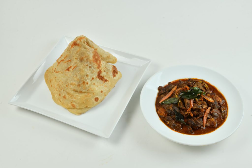 Mutton Curry with a choice of Pittu, Pol Roti, Godamba Roti or Mini ...